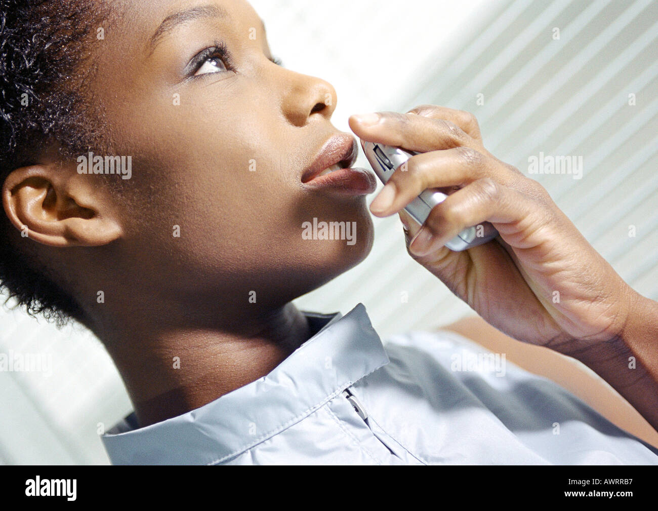 Woman holding futuristic cell phone, close-up, tilt Stock Photo - Alamy