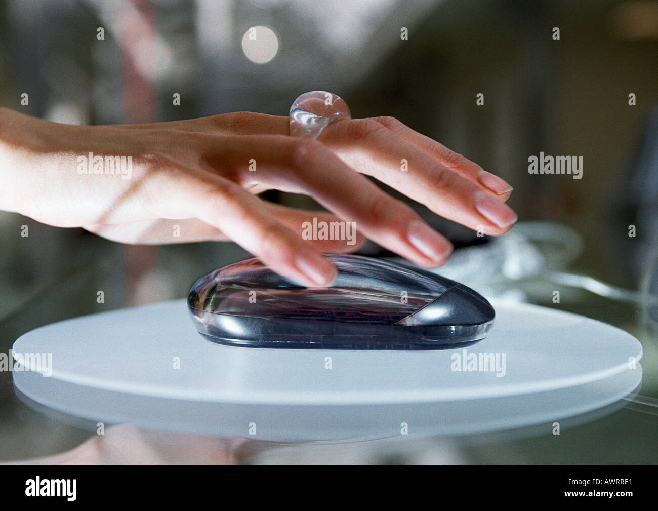 Hand above cordless mouse, close-up Stock Photo - Alamy