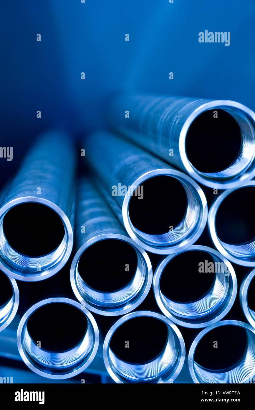 stack of round metal tubes with thread inside viewed end on Stock Photo ...