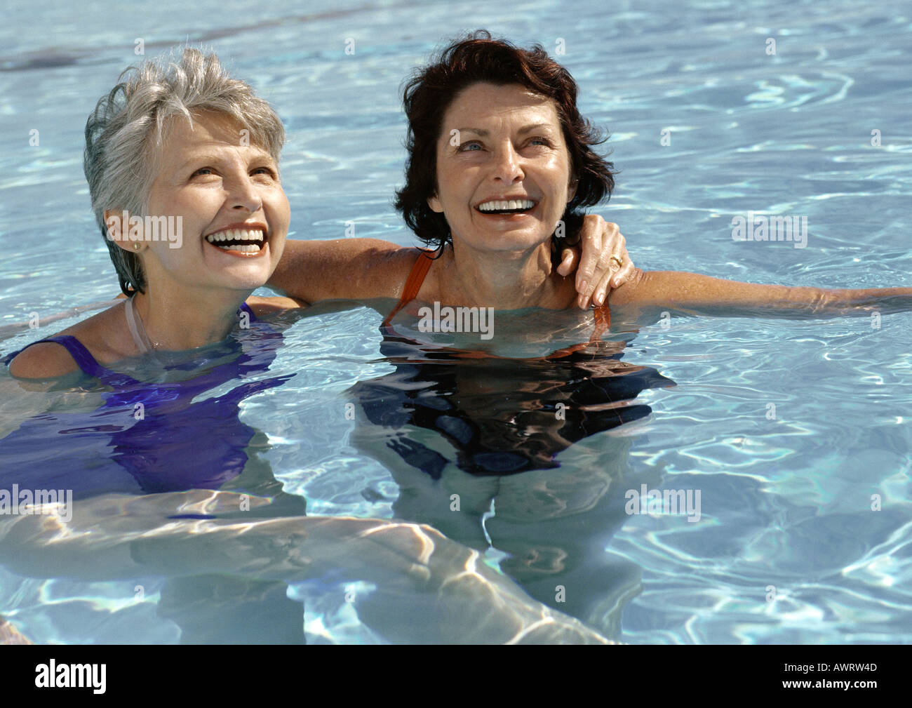 Smiling mature woman wading hi-res stock photography and images - Alamy