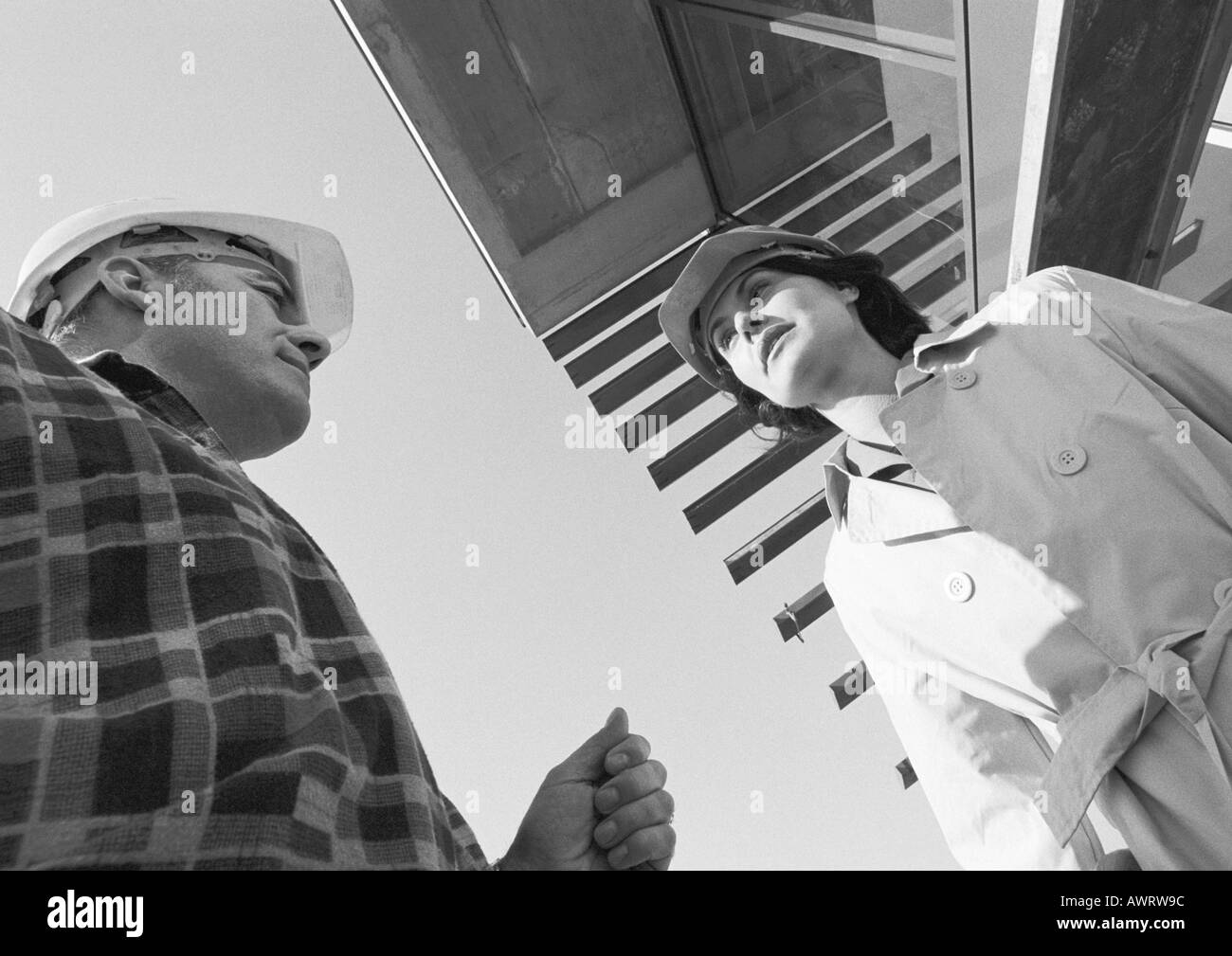 Construction worker woman wearing Black and White Stock Photos & Images ...