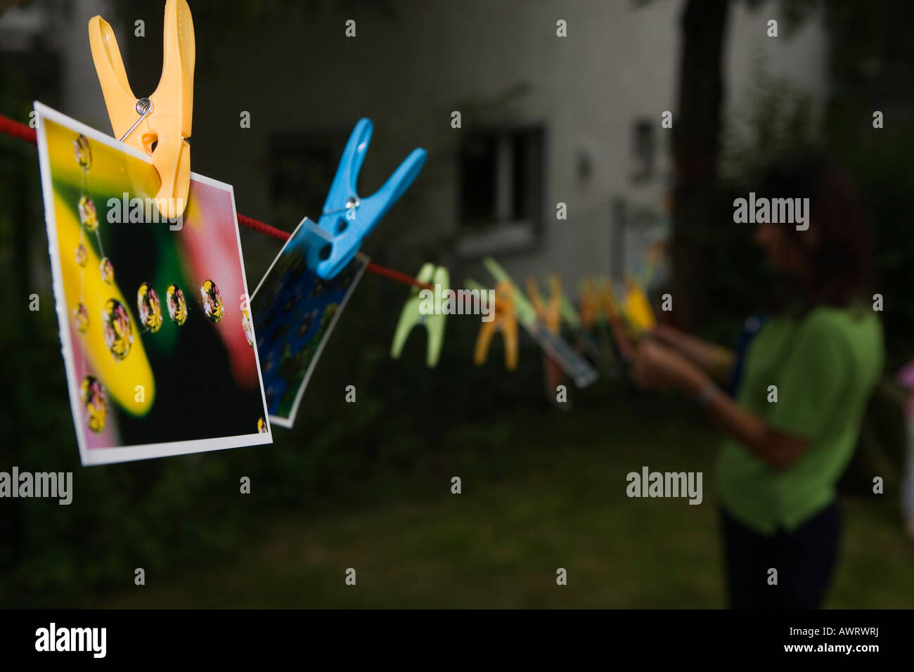 Postcards hanging on a washing line July 2007 Stock Photo - Alamy