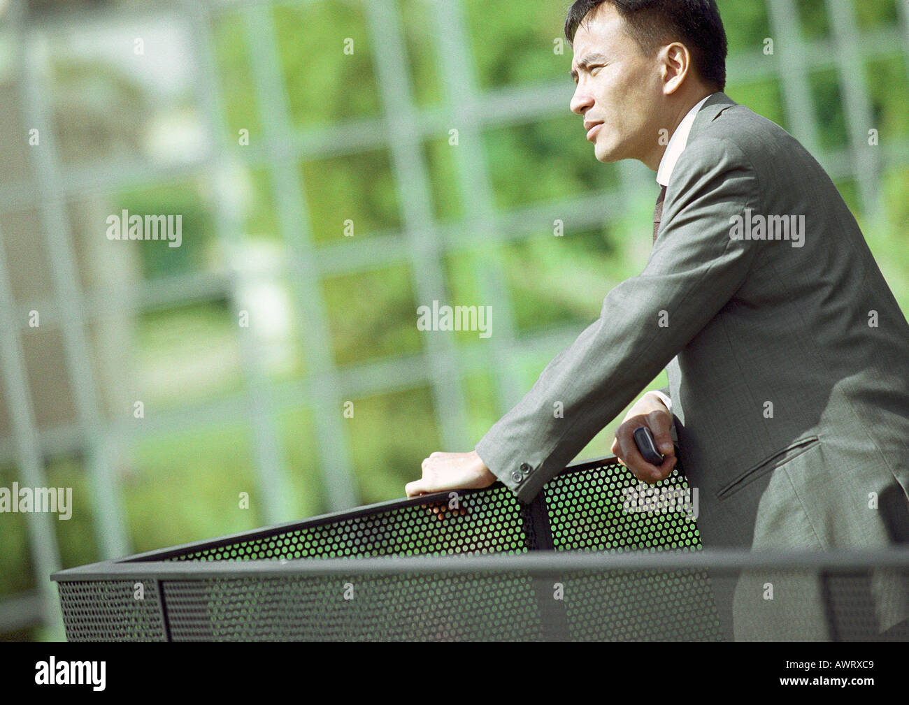 Man leaning on hand rail hi-res stock photography and images - Alamy