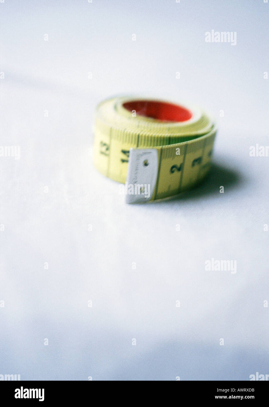 Measuring tape, close-up, blurred Stock Photo - Alamy