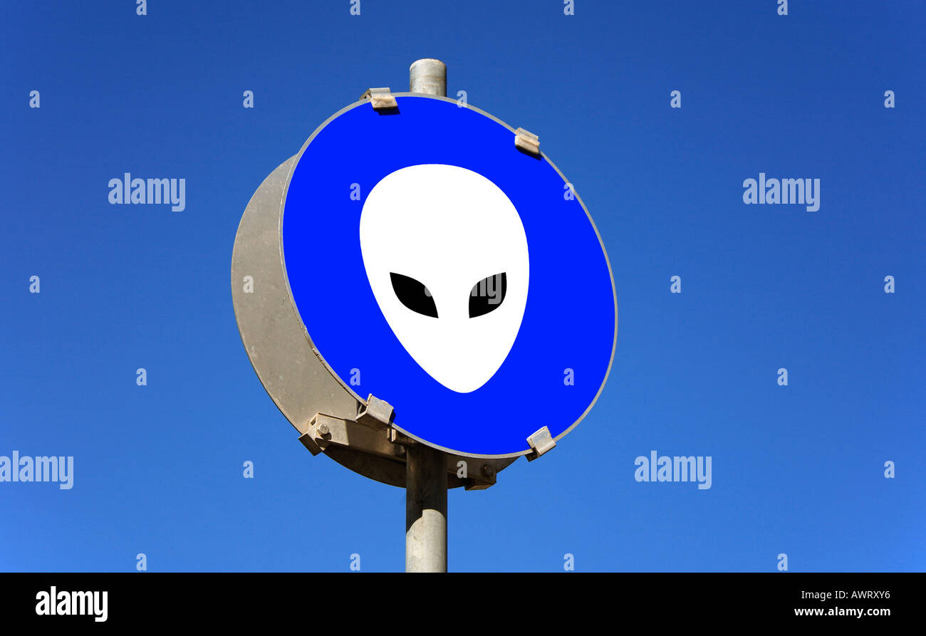 Symbolic photo - traffic sign - alien Stock Photo - Alamy
