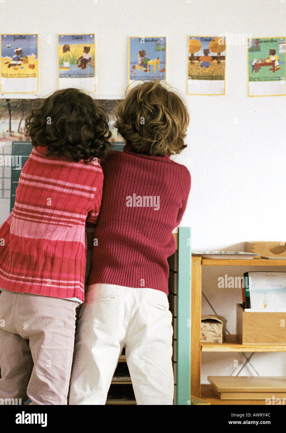 Two children side by side, rear view Stock Photo - Alamy
