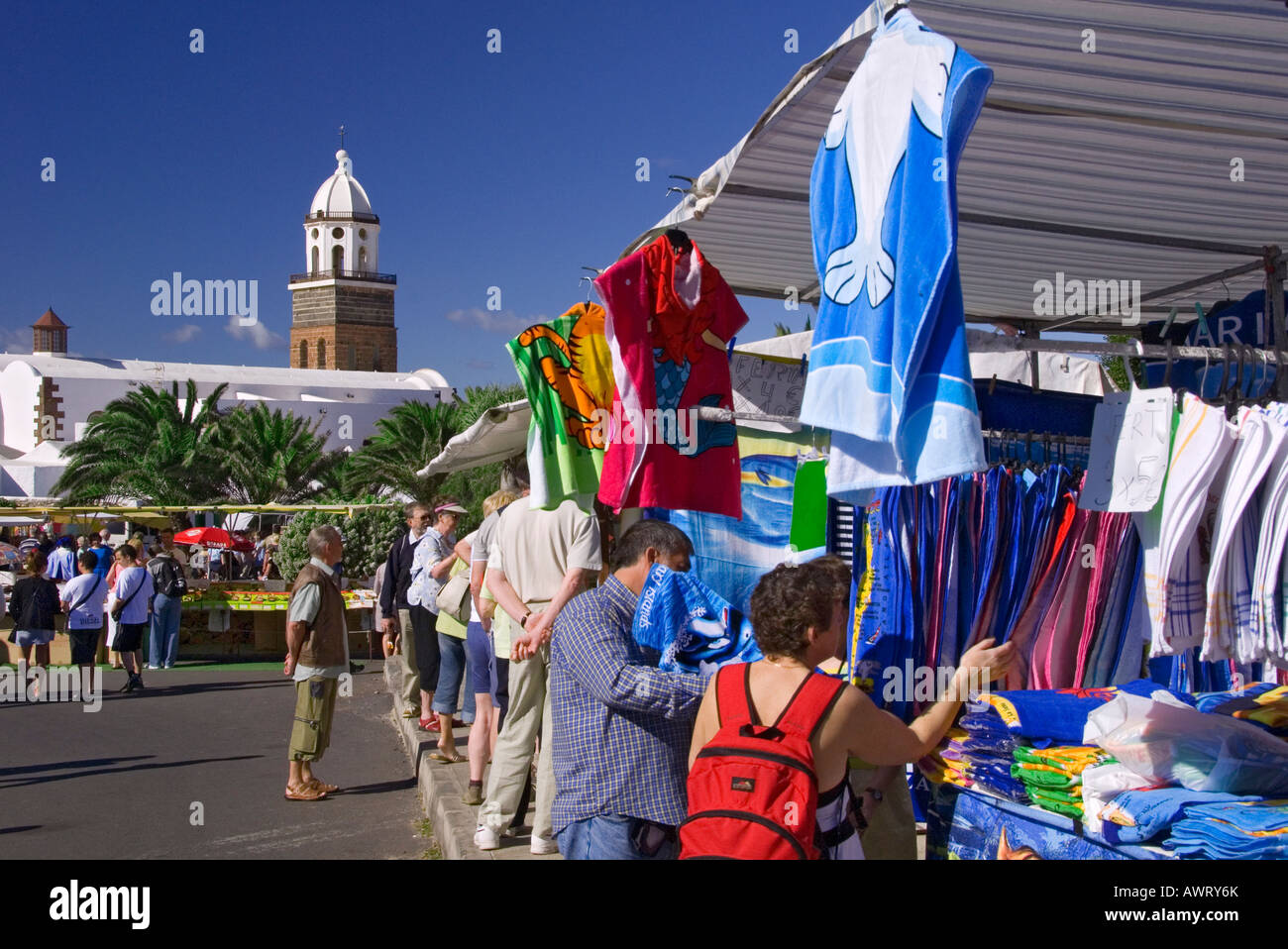 TEGUISE Sunday market day stalls and church spire in Teguise old town ...