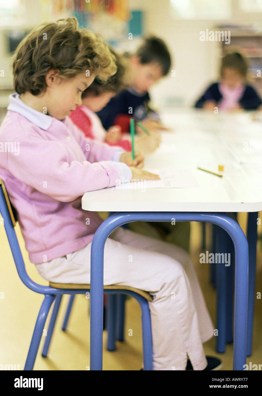 Children in classroom, side view Stock Photo - Alamy