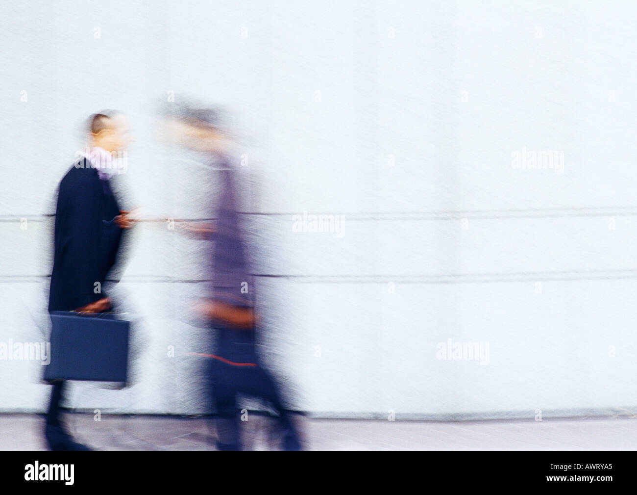 Two businessmen holding briefcases hi-res stock photography and images ...