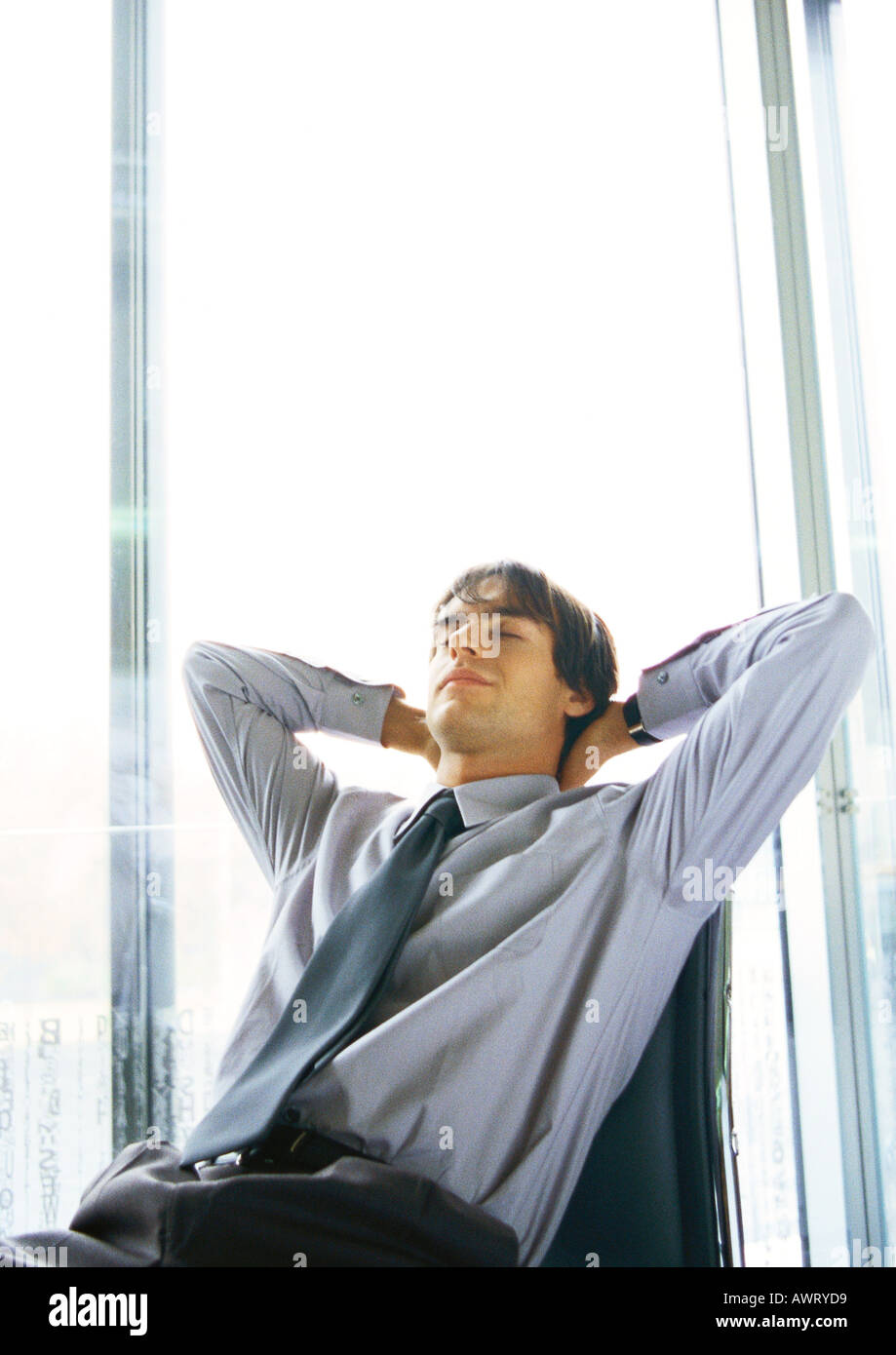 Man Leaning Back In Chair High Resolution Stock Photography and Images ...