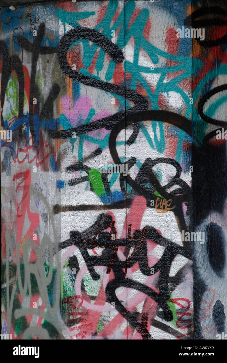 Graffiti on concrete posts Stock Photo - Alamy