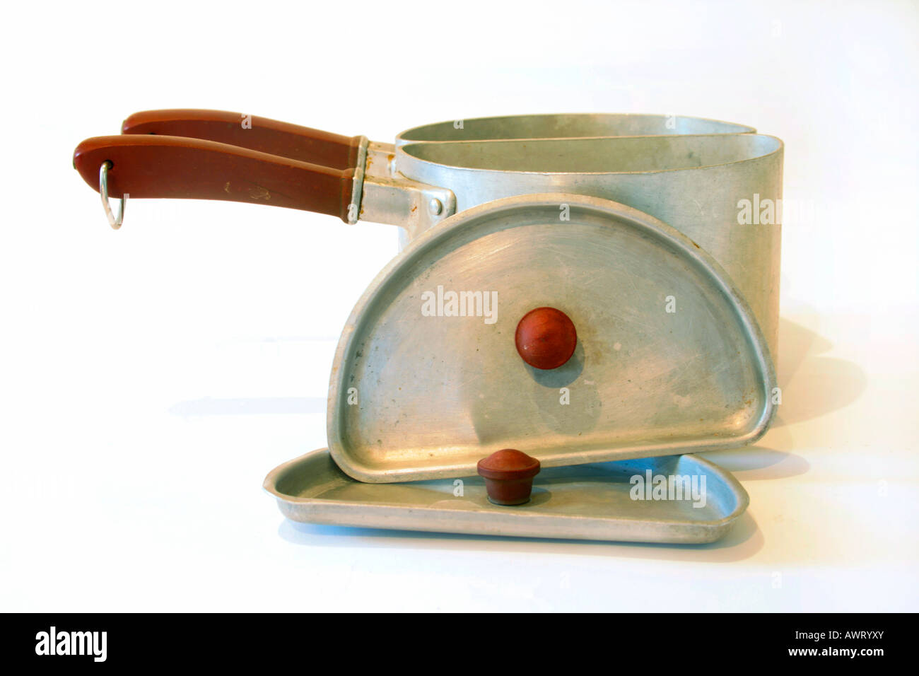 Swan split saucepans. Divided saucepans. Two half saucepans that use ...