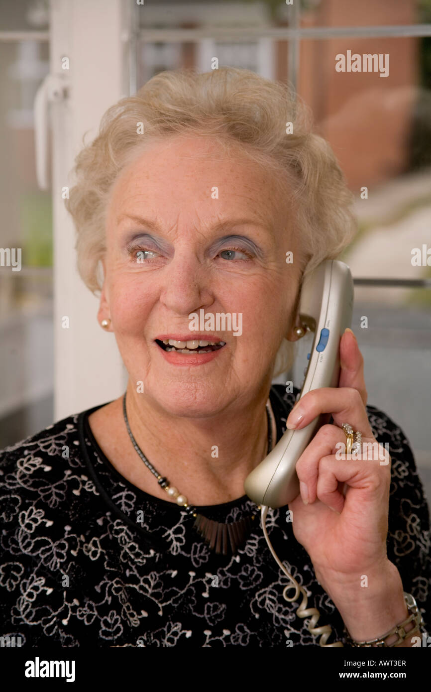 Phone call home elderly hi-res stock photography and images - Alamy