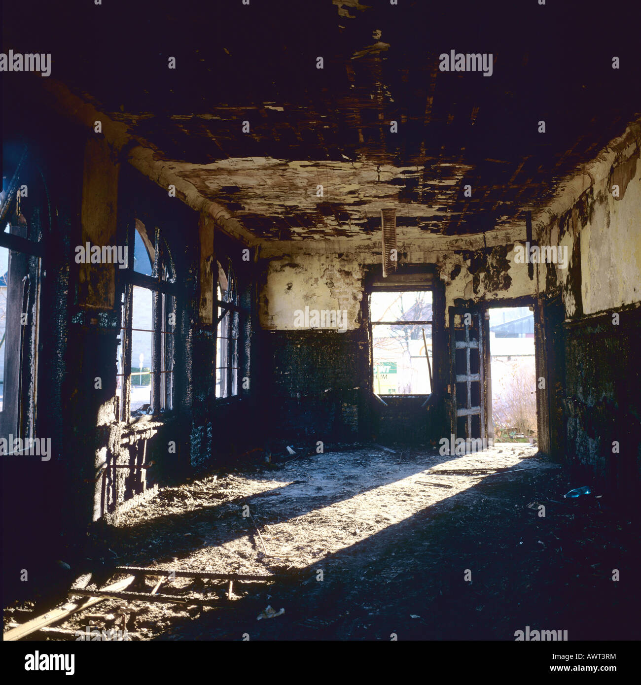 Blackened interior of Brasserie Au Petit Rhin restaurant building ...