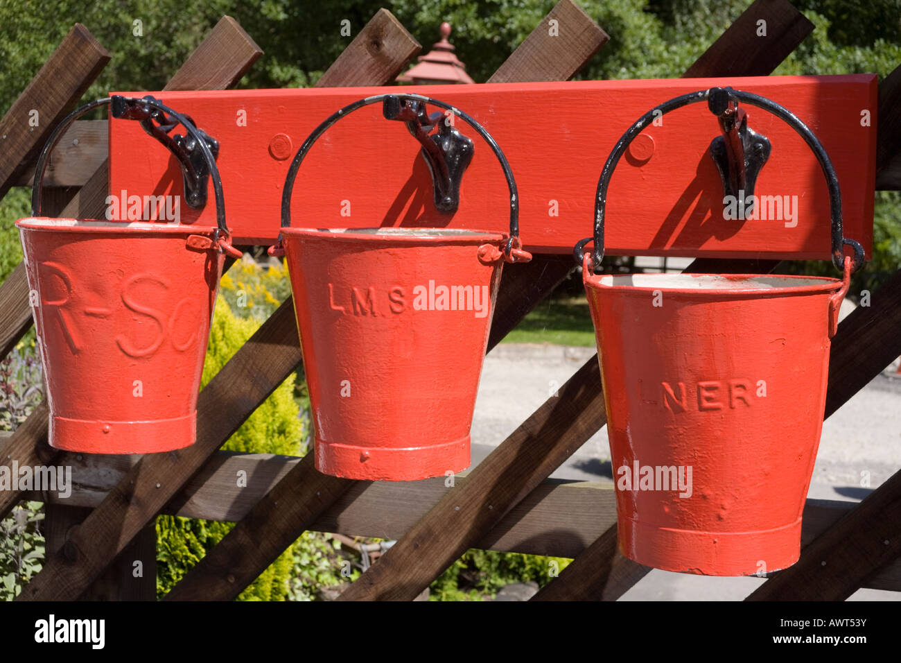Three red fire buckets on the station platform on the North Yorkshire ...
