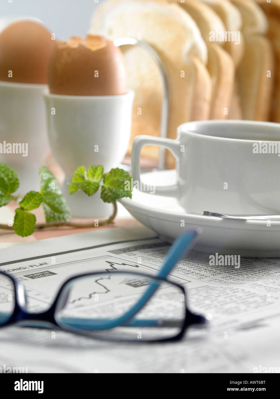 Breakfast on Table with Newspaper Stock Photo - Alamy