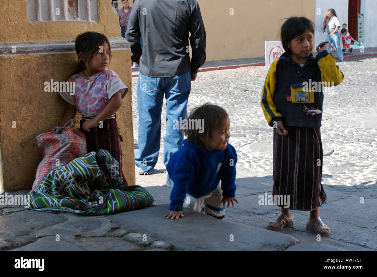 Children beg for money outside a store in Antigua Guatemala 2005 Stock ...