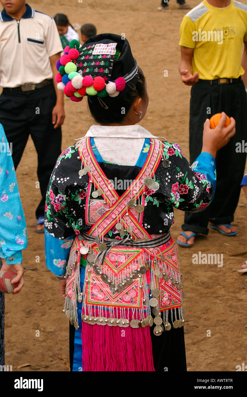 Laos Luang Prabang district back of Hmong woman in traditional dress ...