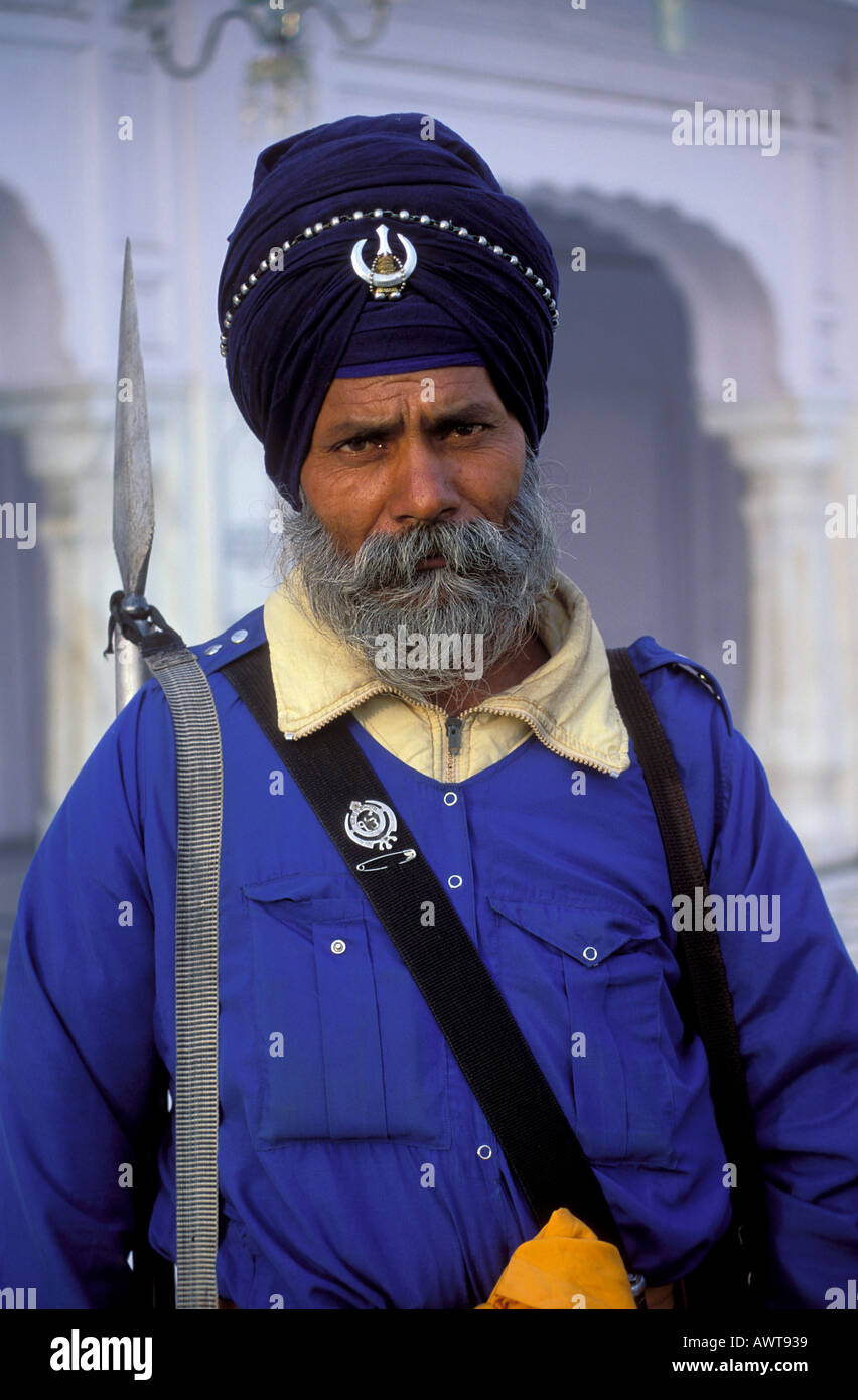 Indian man from the Sikh religion wearing turban at the Golden Temple ...