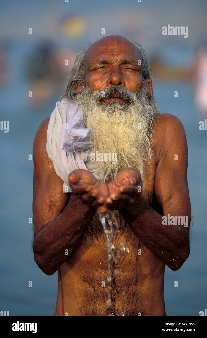 Hindu man pray at the Ganges river Kumbh Mela festival 2001 Allahabad ...