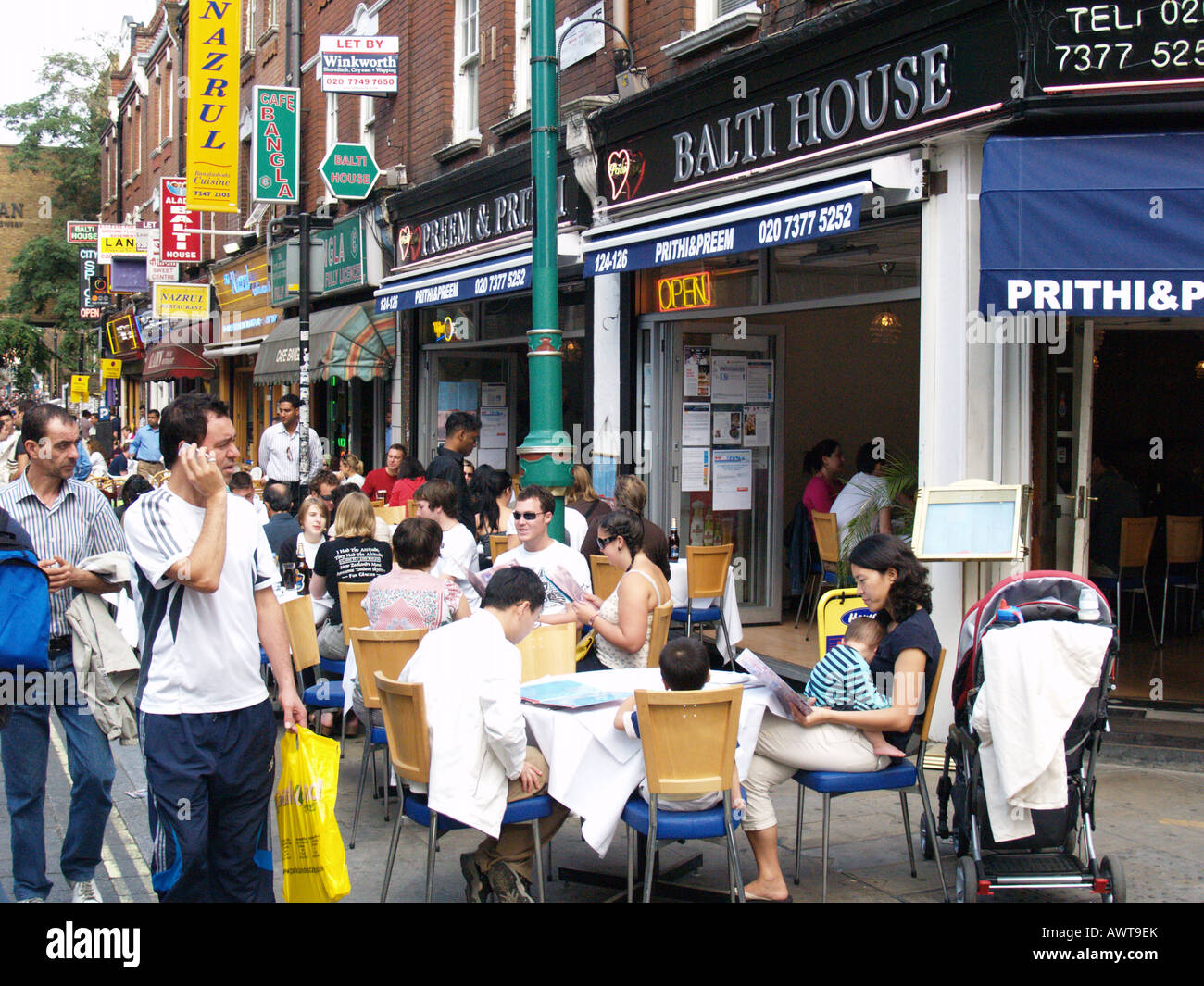 alfresco outdoor indian restaurant diners eating annual brick lane food ...