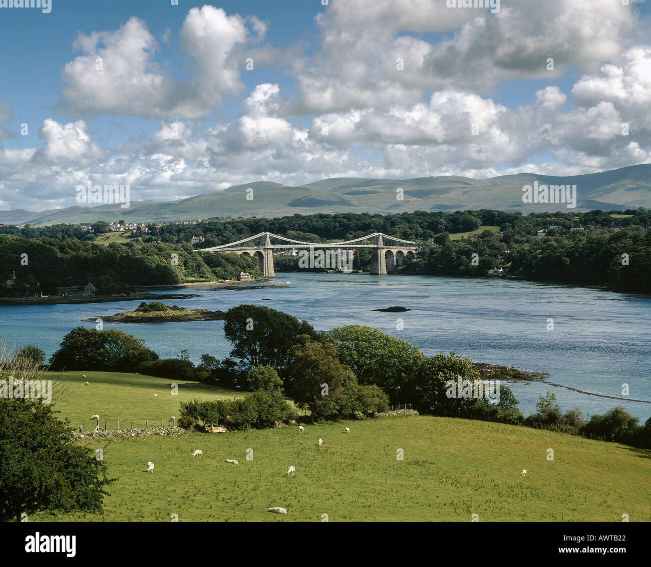 THE MENAI SUSPENSION BRIDGE AND MENAI STRAITS FROM ANGLESEY WALES Stock ...