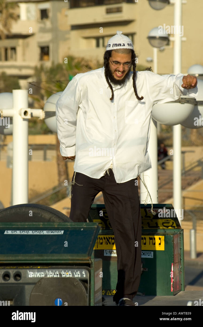 Israel orthodox jew with white shirt and head cap dancing Stock Photo ...