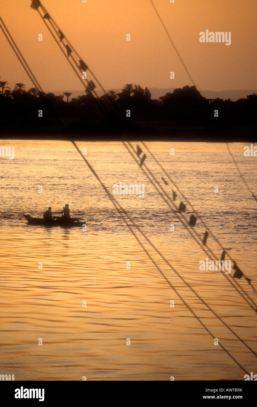 Two Men In A Rowing Boat,On The River Nile At Evening Time Stock Photo ...
