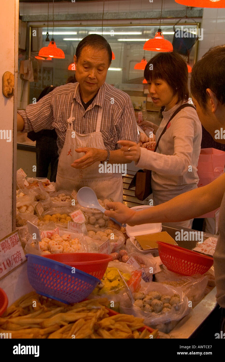 Chinese female shop assistant hi-res stock photography and images - Alamy