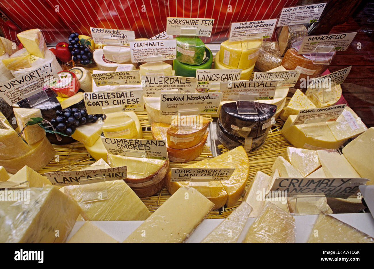 Wide selection of typical regional organic English cheeses on display ...