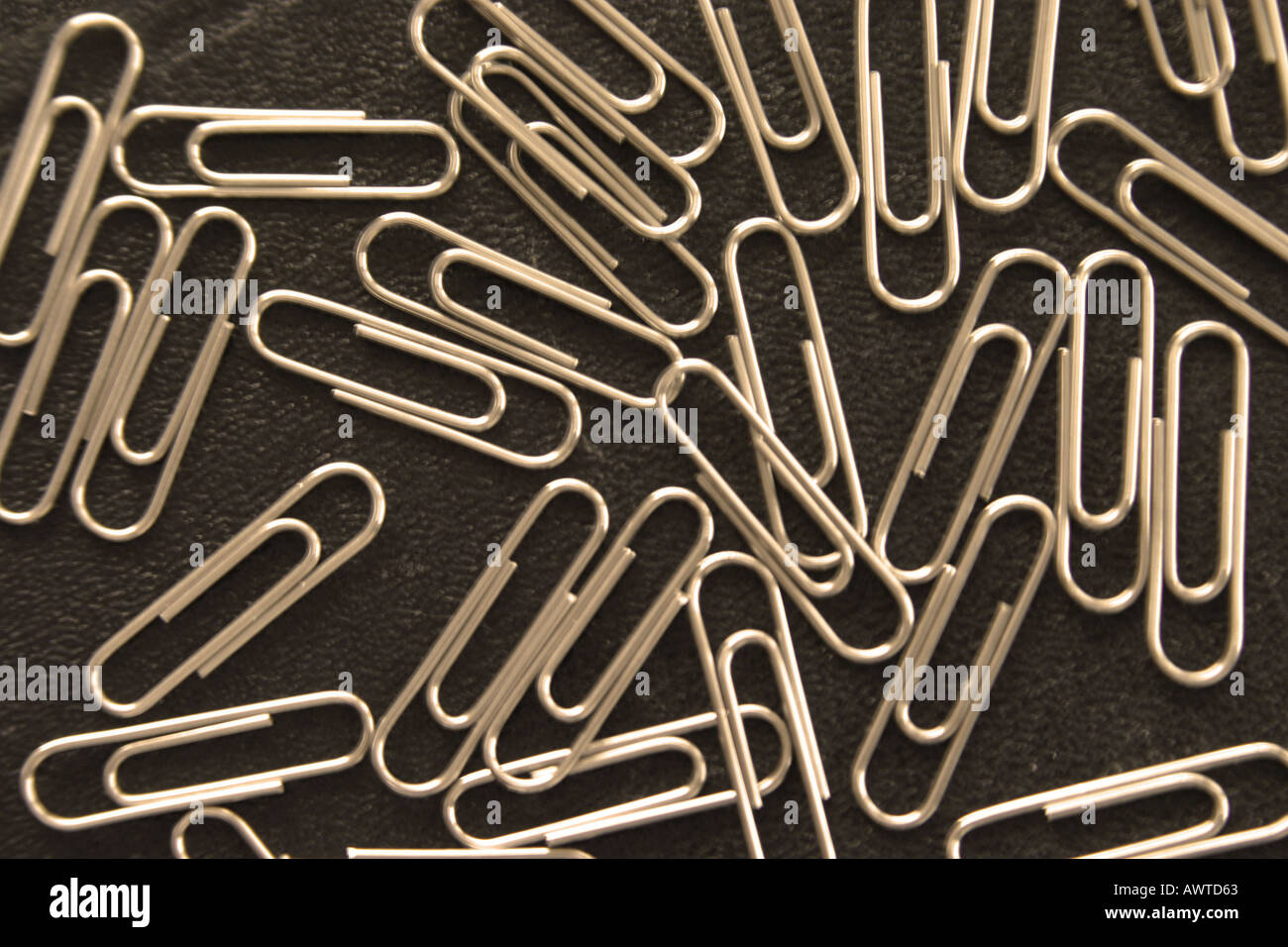 Silver paperclips hi-res stock photography and images - Alamy