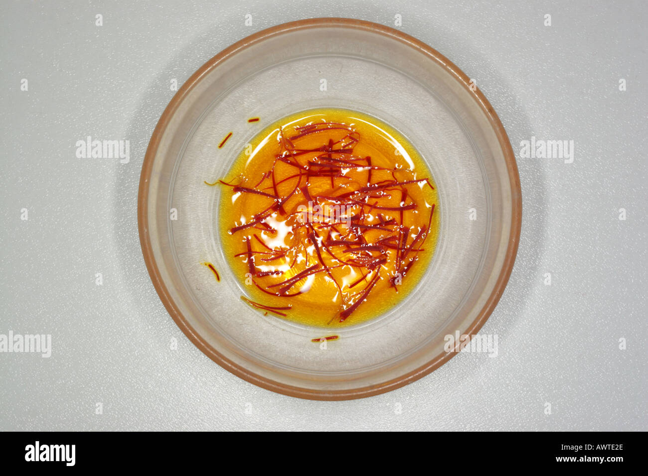 Saffron in water Yellow food spice flavouring flavoring expensive ...