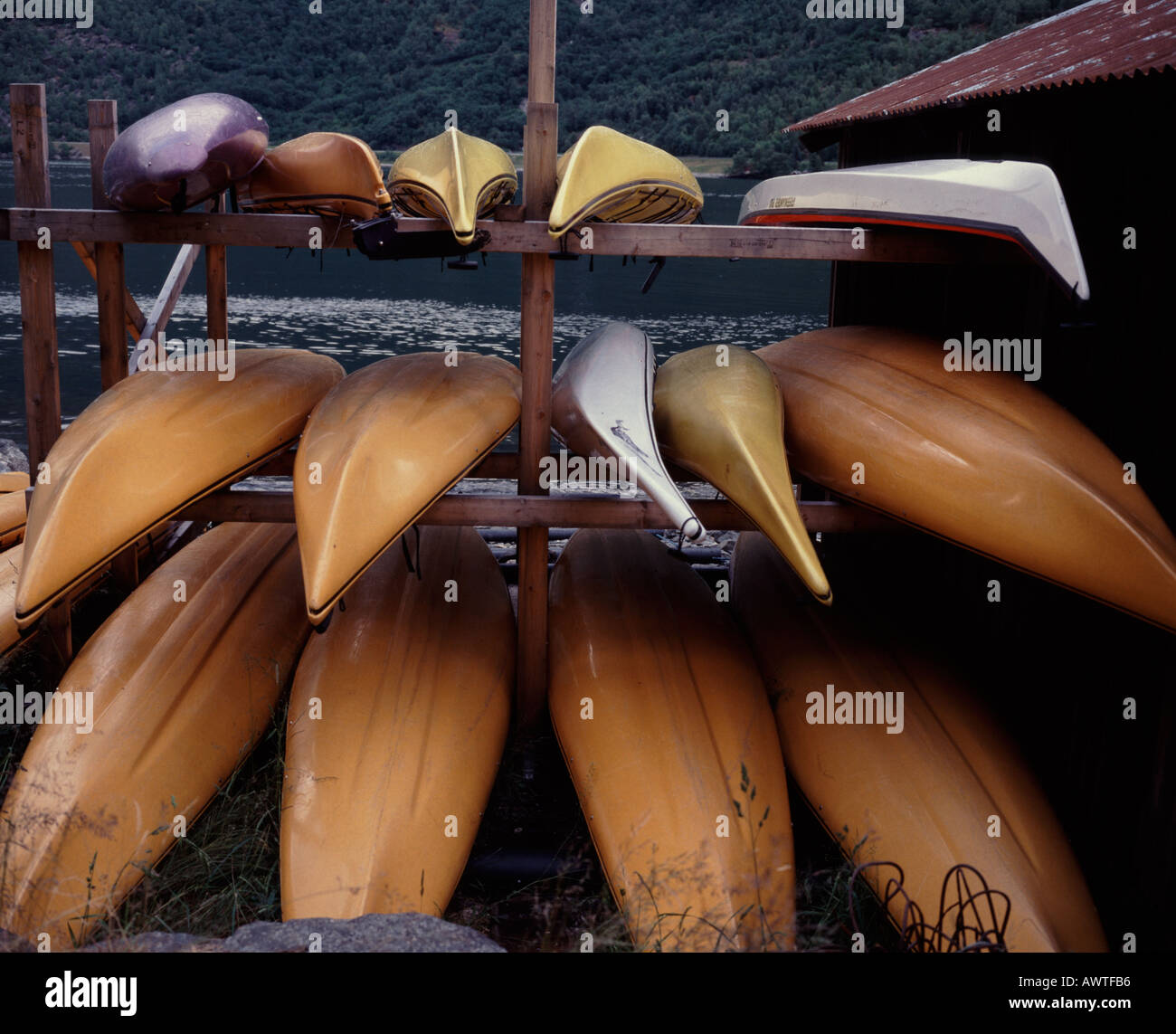 Stack of yellow canoes Aurlandsfjord Flam Norway Stock Photo - Alamy