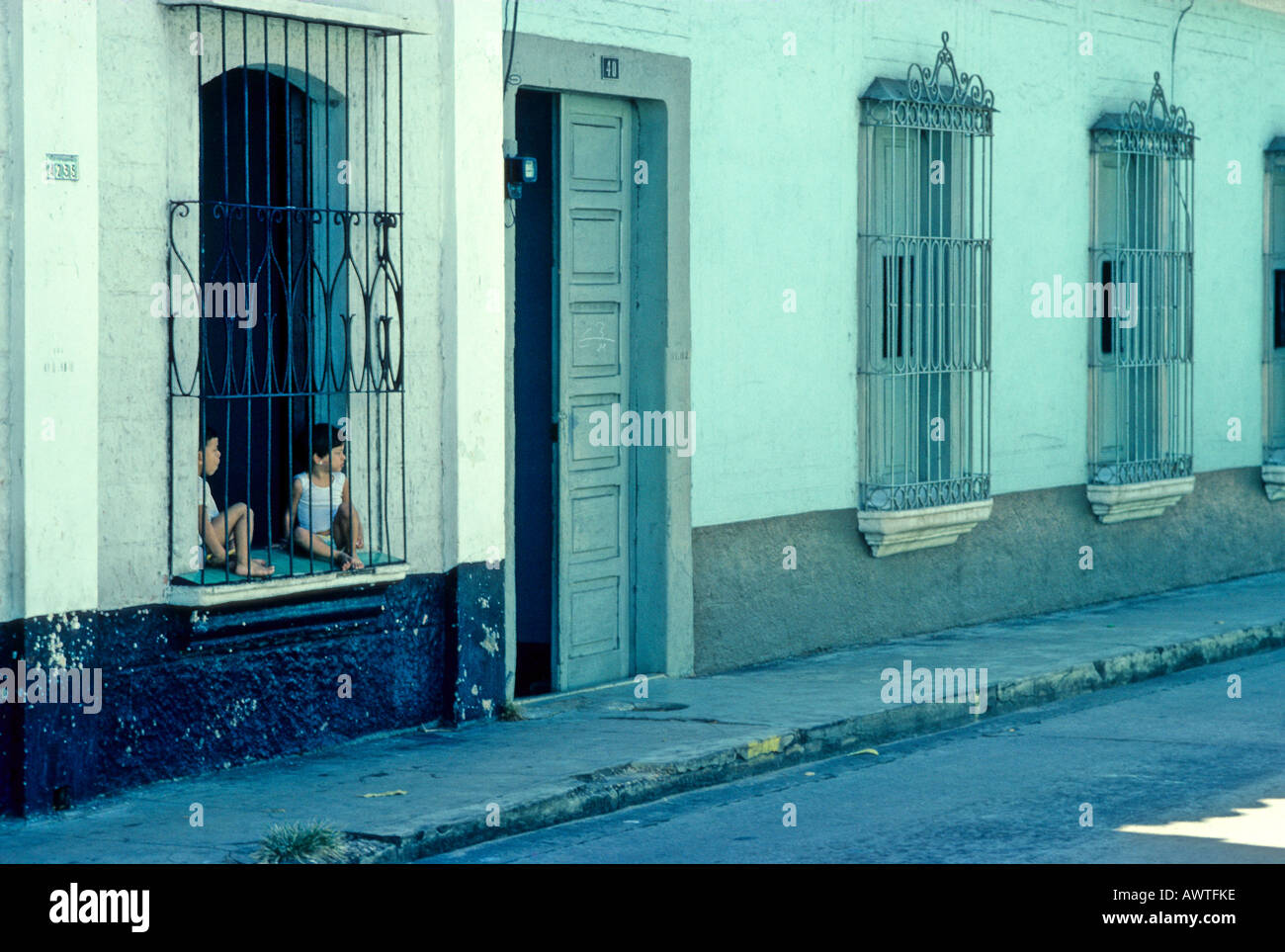 Children in Window [2] Stock Photo - Alamy