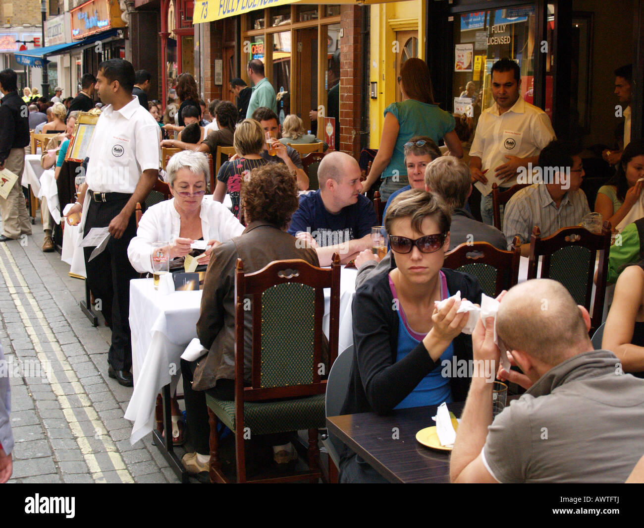 alfresco outdoor indian restaurant diners eating annual brick lane food ...