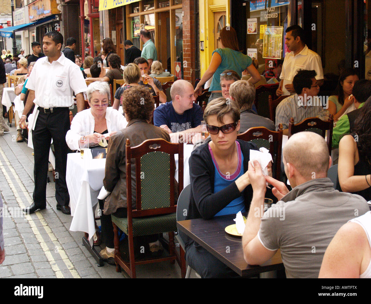 alfresco outdoor indian restaurant diners eating annual brick lane food ...