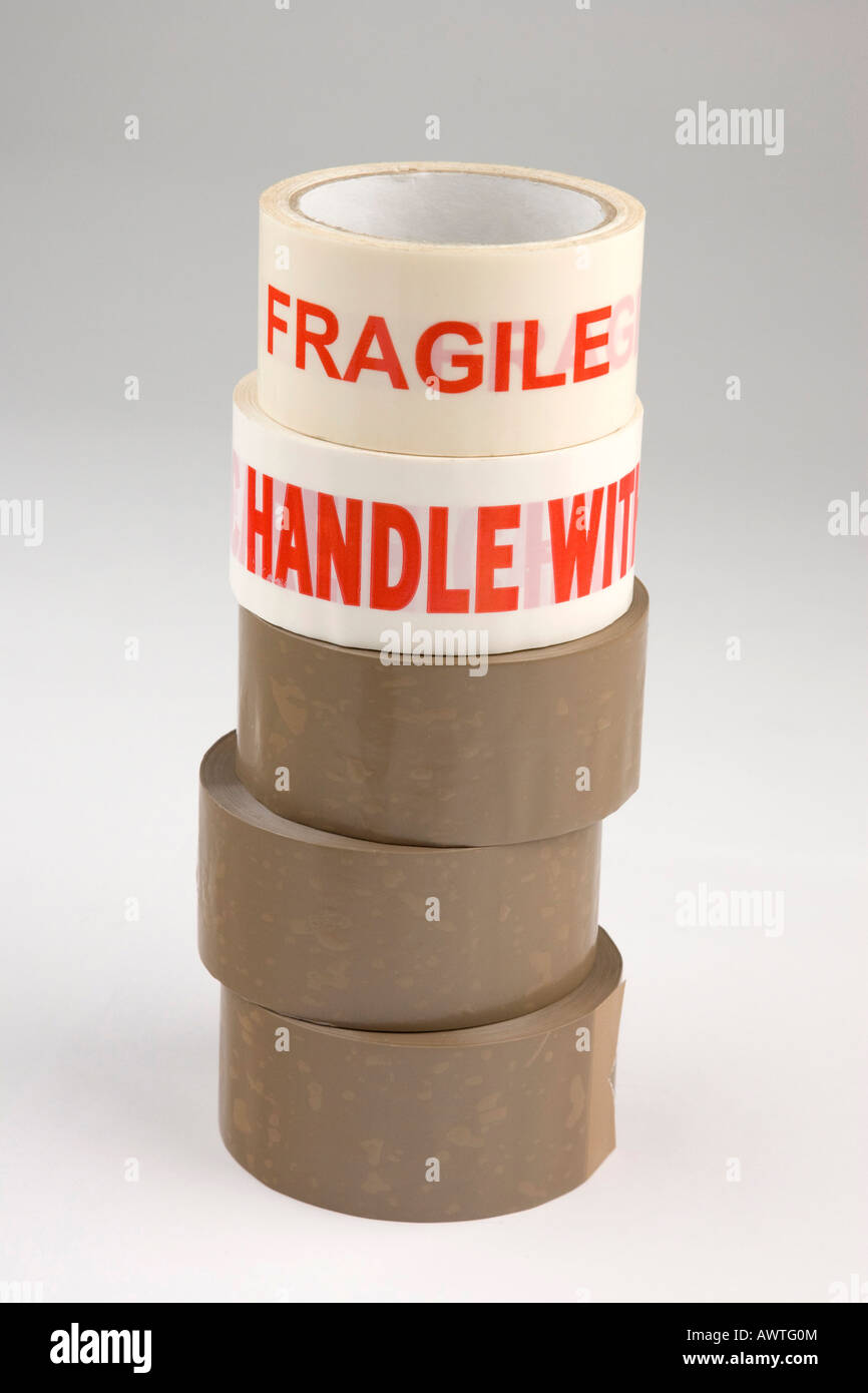 rolls of adhesive backed packaging tape Stock Photo - Alamy