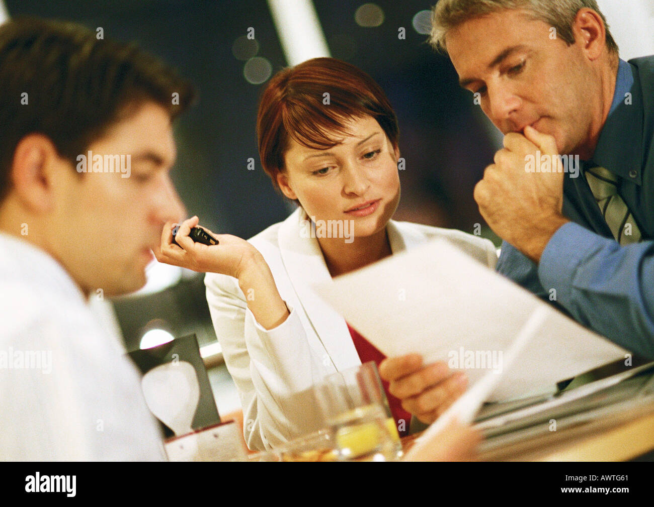 Young man focusing on documents hi-res stock photography and images - Alamy