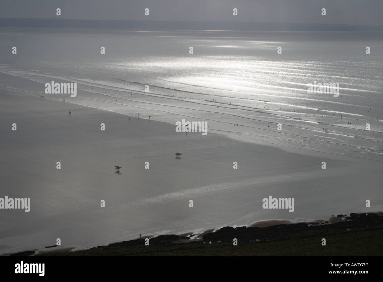 summer holiday sunlit reflection of beach estuary surfers Stock Photo ...