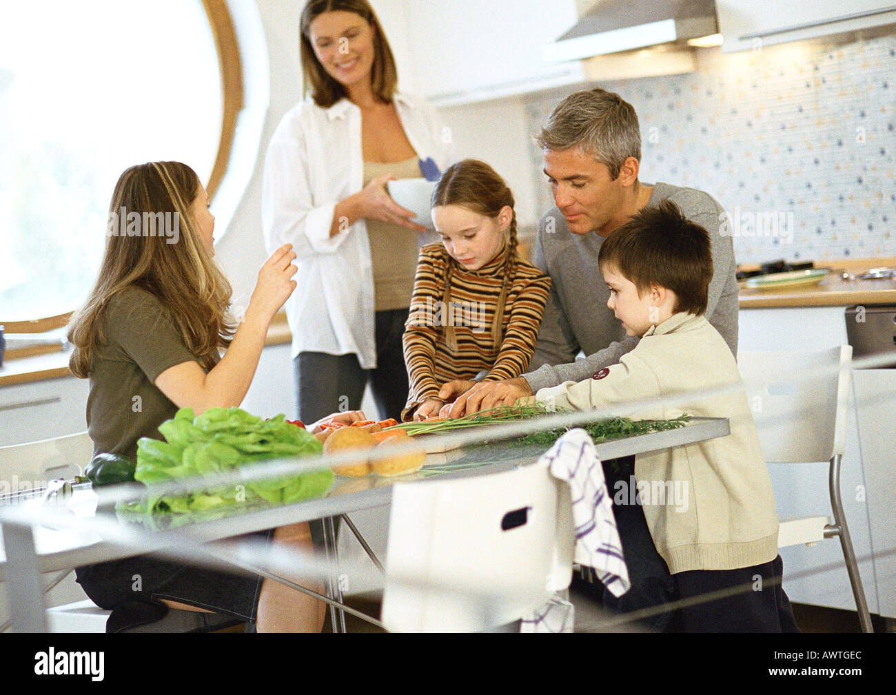 Family in kitchen, portrait Stock Photo - Alamy