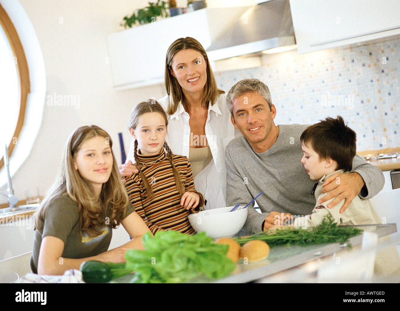 Family in kitchen, portrait Stock Photo - Alamy