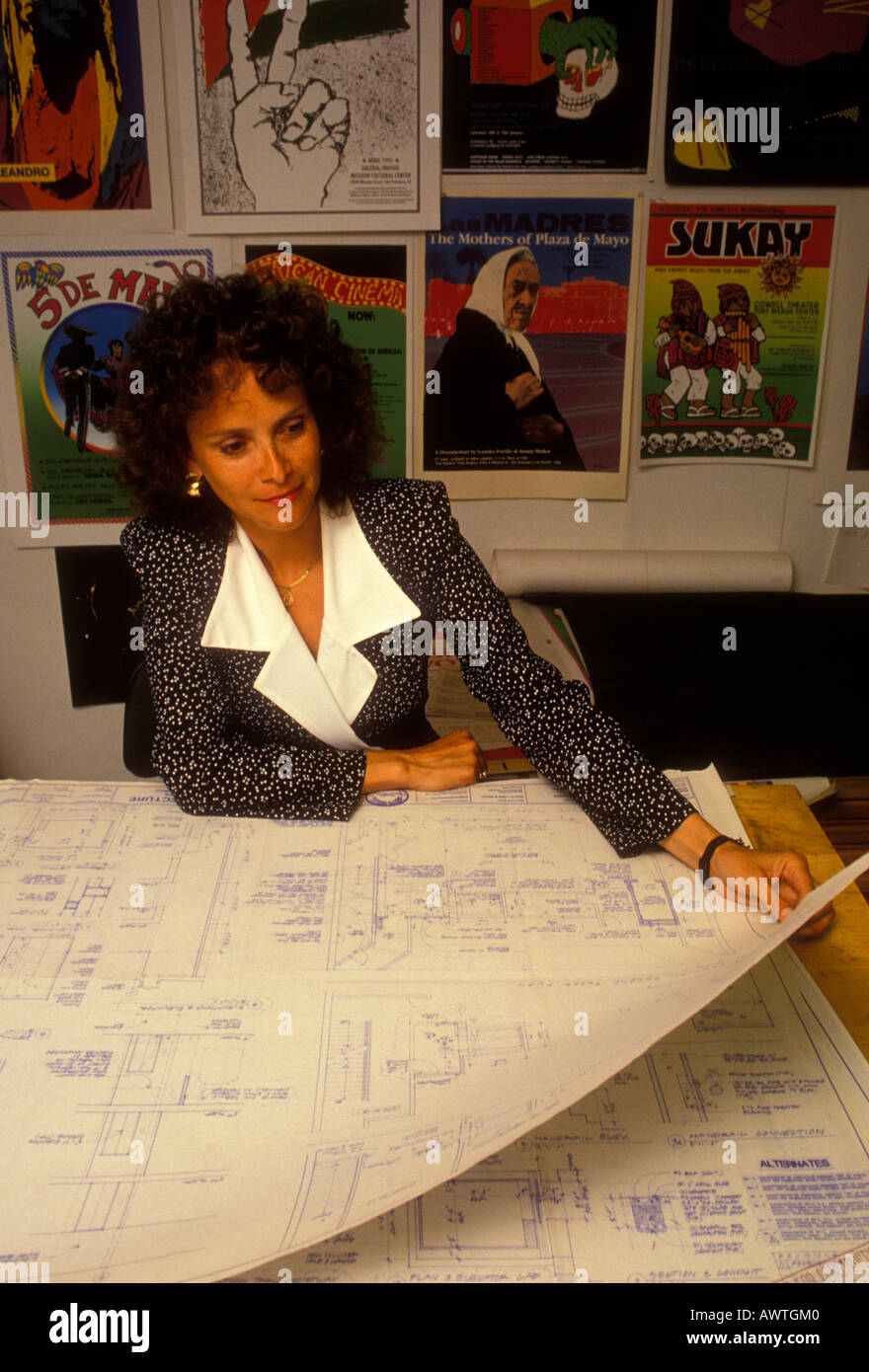 Hispanic people adult woman reading blueprint at the Mission Cultural ...