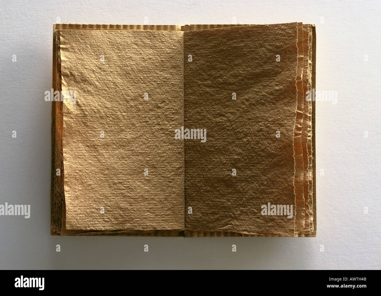 Open book made from recycled paper, close-up Stock Photo - Alamy