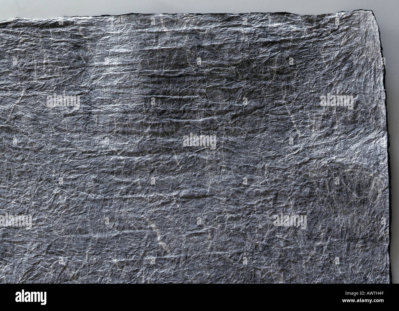 Wrinkled grey paper Stock Photo - Alamy