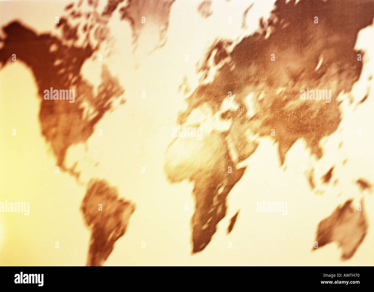 Map of the world, blurred, sepia Stock Photo - Alamy