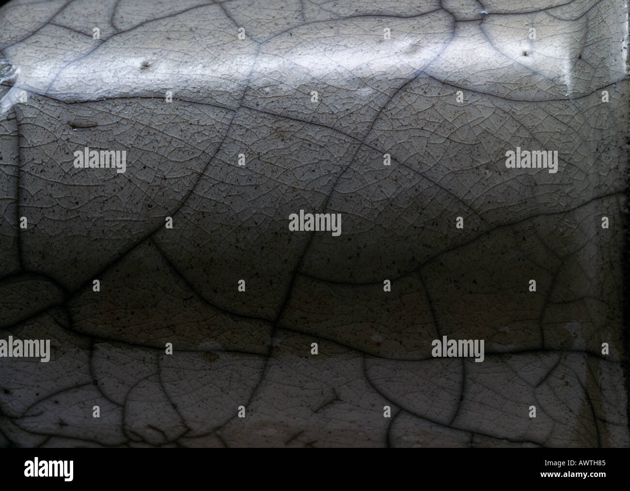 Crazing of gray ceramic, extreme close-up Stock Photo - Alamy