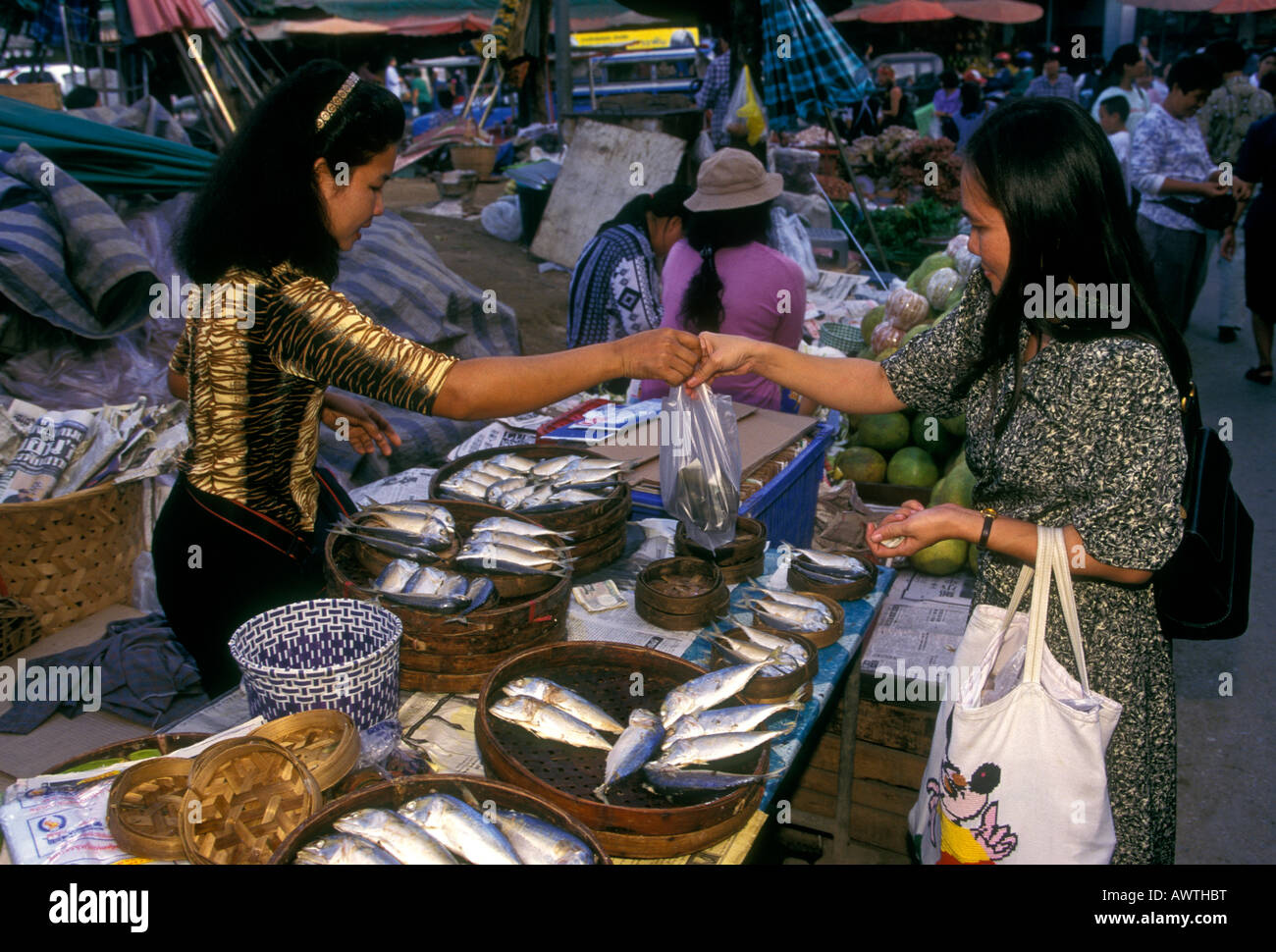 Thai woman, street vendor, seafood vendor, selling fresh fish, fish ...