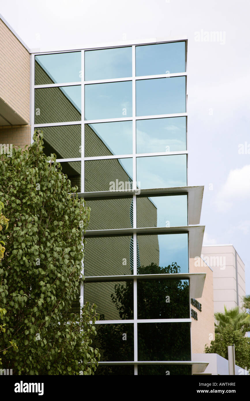 Glass building reflects cloudy sky at Central Florida Community College ...
