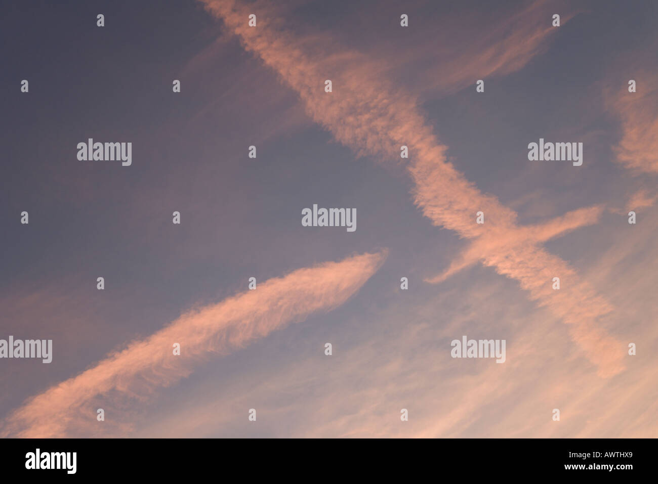 Pink jet sky trails hi-res stock photography and images - Alamy