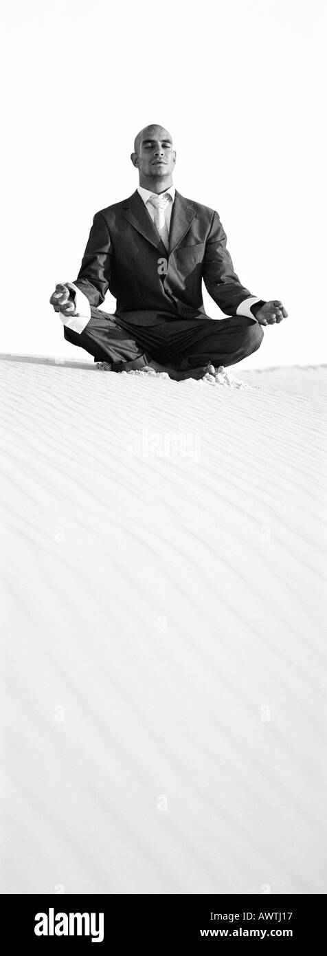 Man lotus position suit Black and White Stock Photos & Images - Alamy